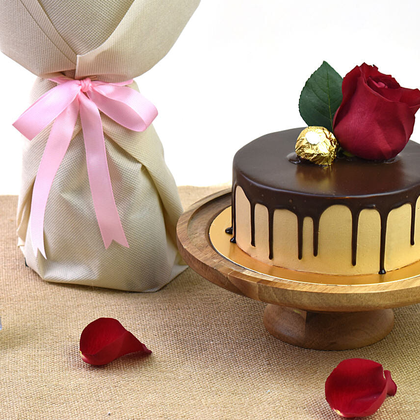 Online Half Kg Cake With 24 Pcs Ferrero And Flowers Gift Delivery in ...