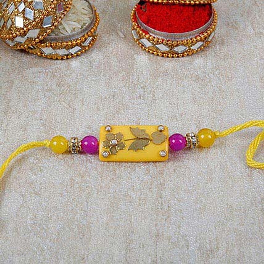 Order Bright Yellow Rectangle Rakhi Online | Same-Day Delivery UAE - Fnp.ae