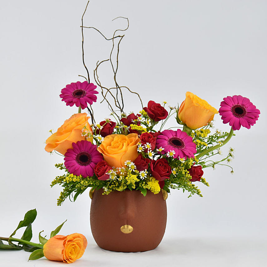 Online Chromatic Flowers Arrangement Gift Delivery in UAE - FNP
