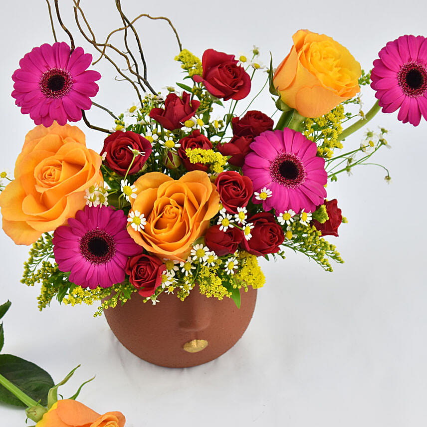 Online Chromatic Flowers Arrangement Gift Delivery in UAE - FNP
