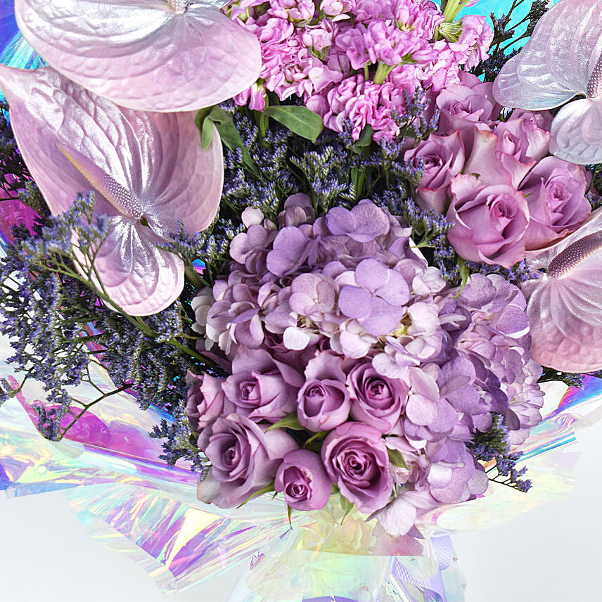 أون لاين باقة ورد لون موف أنثوريوم في غلاف لامع مميز جداً و كيك توصيل ...