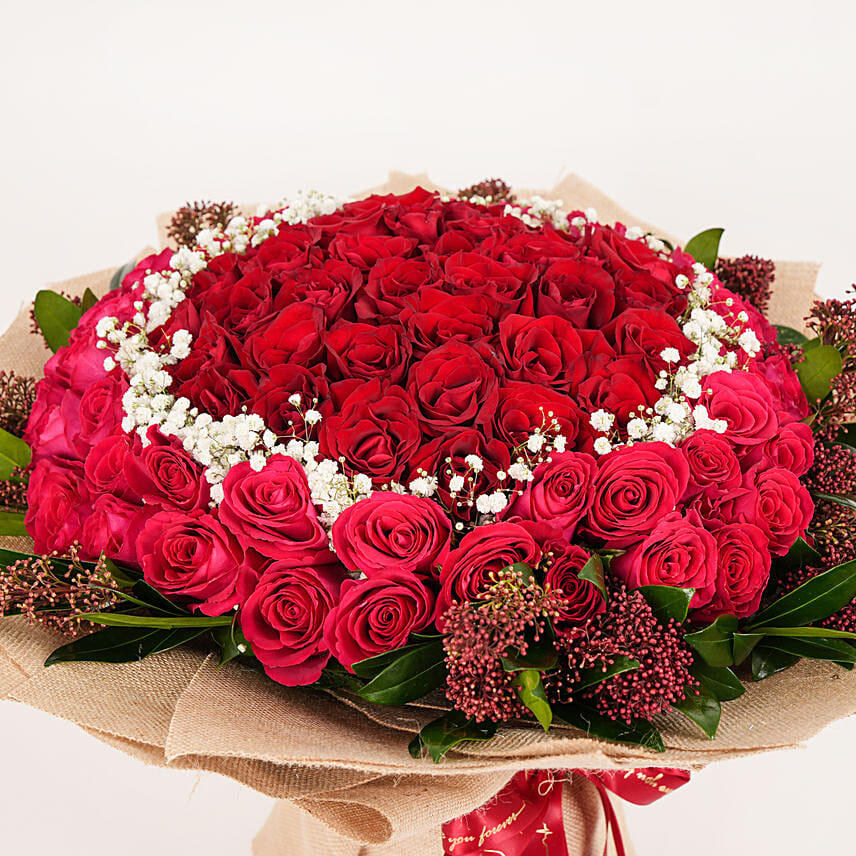Order 75 Roses and Skimmia Bouquet Online | Same-Day Delivery UAE - Fnp.ae
