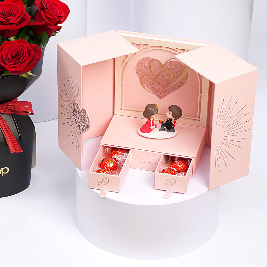 Order Red Roses and Dancing Couple Box Online | Same-Day Delivery UAE ...