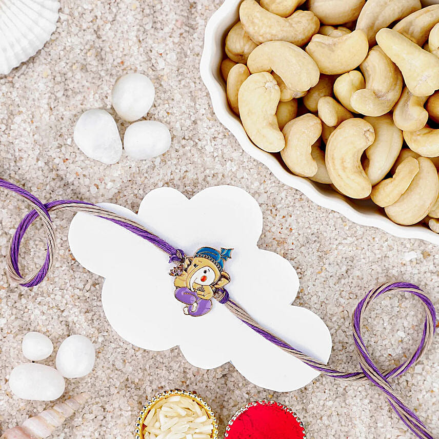 Order Bal Ganesha Cheerful Charm Rakhi N Roasted Cashews Gift Set ...