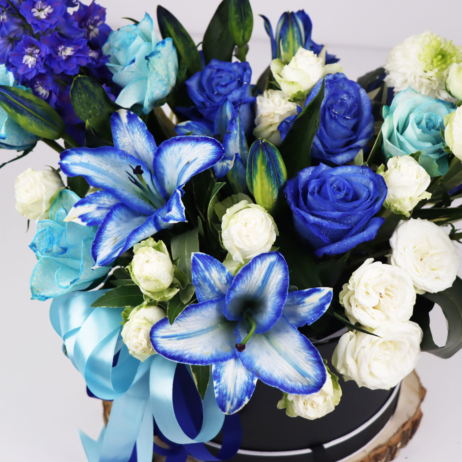 Online Bloomy Blue Flowers Box Arrangement Gift Delivery in Oman - FNP