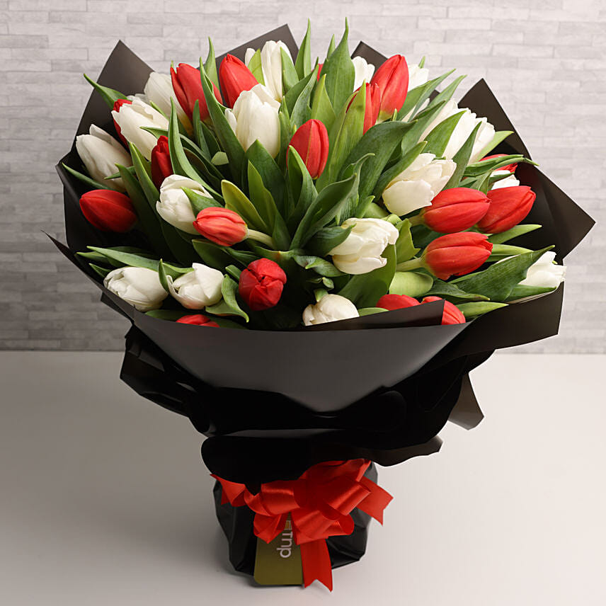 Online 40 Tulips Hand Bouquet Gift Delivery in Qatar - FNP