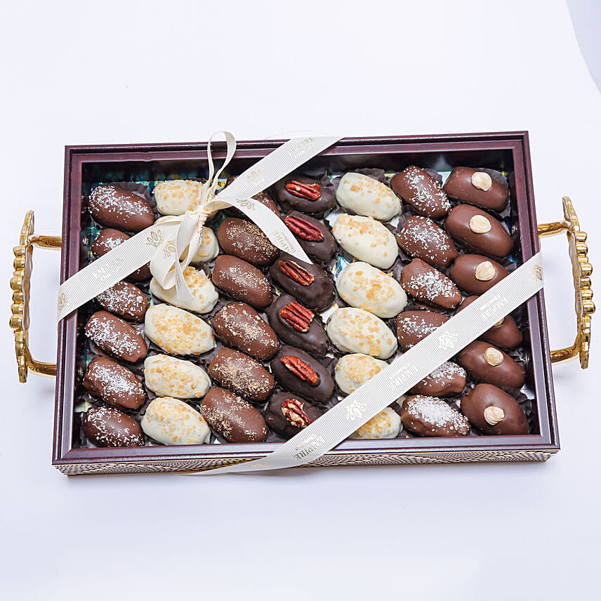 Online Assorted Dates Tray With Beautiful Flowers Gift Delivery in ...