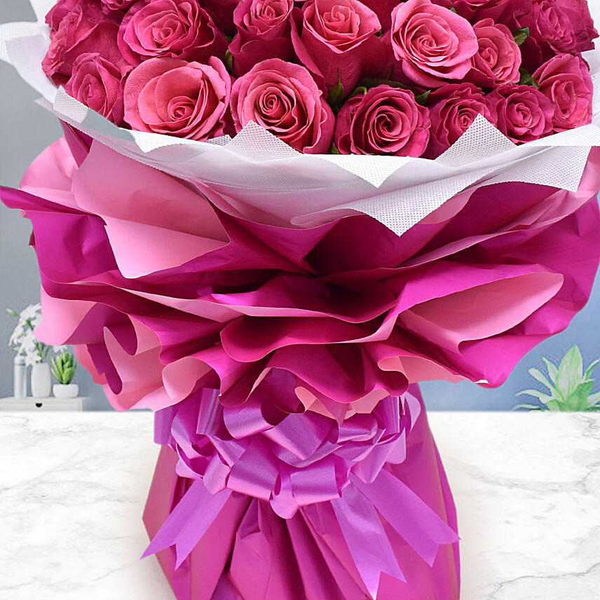 Online Majestic 50 Dark Pink Roses Gift Delivery in Saudi-arabia - FNP