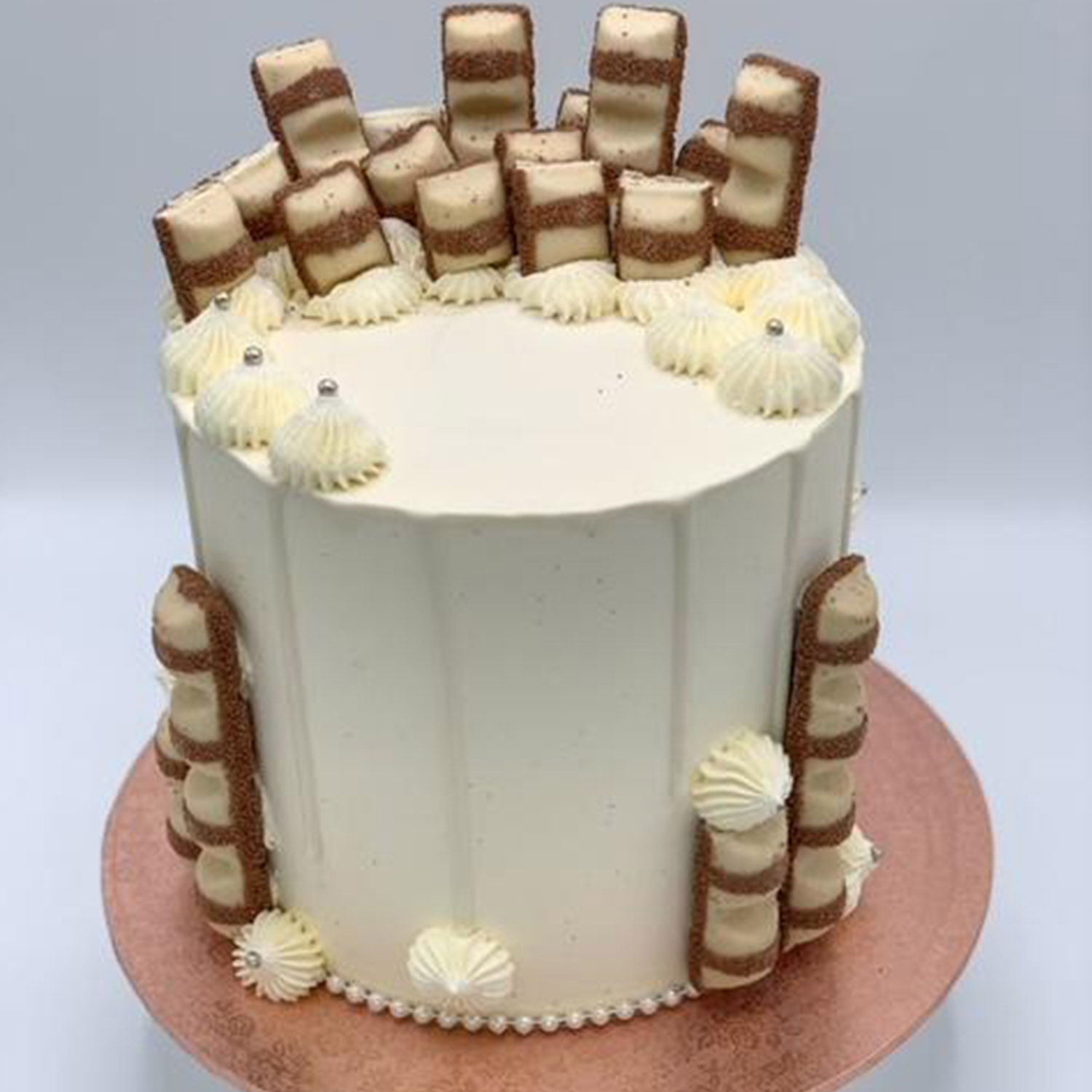 Online White Kinder Bueno Chocolate Drip Cake 8 Inch Gift Delivery in ...
