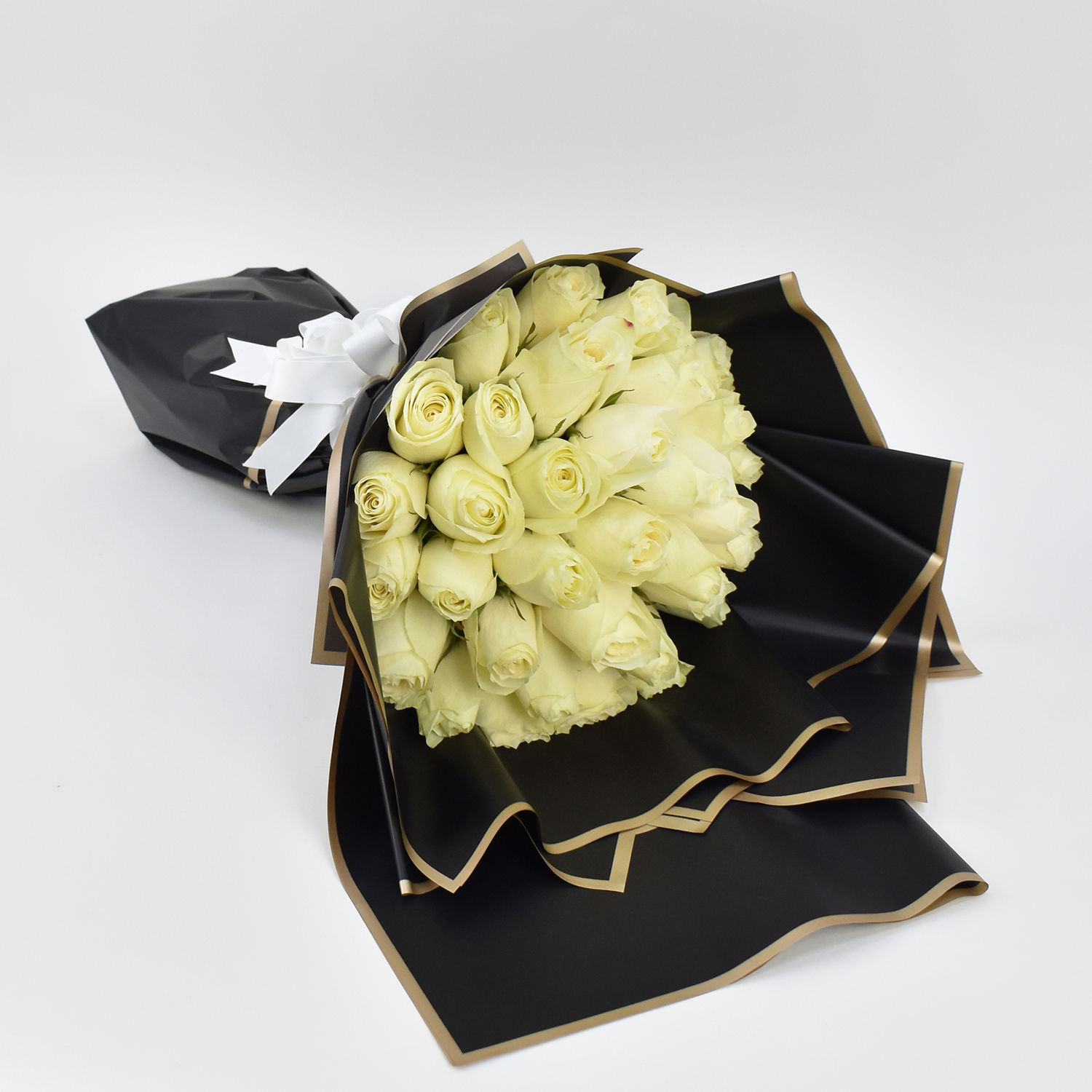 Order 35 White Roses Designer Bouquet Online | Same-Day Delivery UAE ...