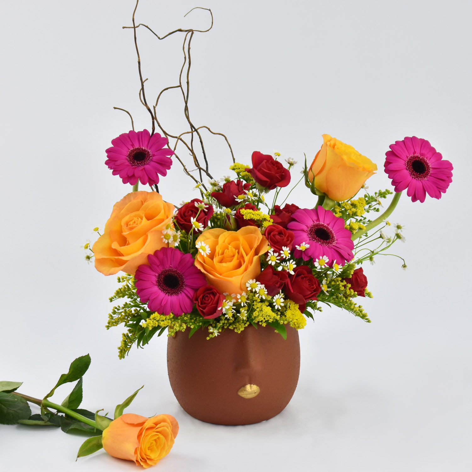 Online Chromatic Flowers Arrangement Gift Delivery in UAE - FNP