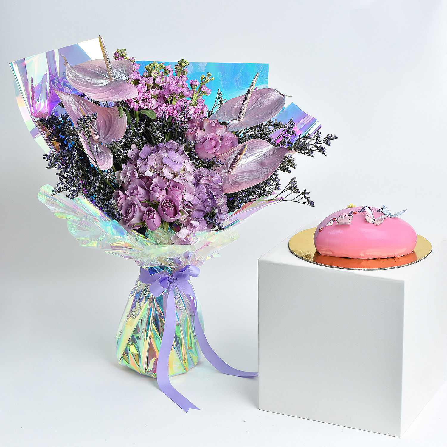 أون لاين باقة ورد لون موف أنثوريوم في غلاف لامع مميز جداً و كيك توصيل ...