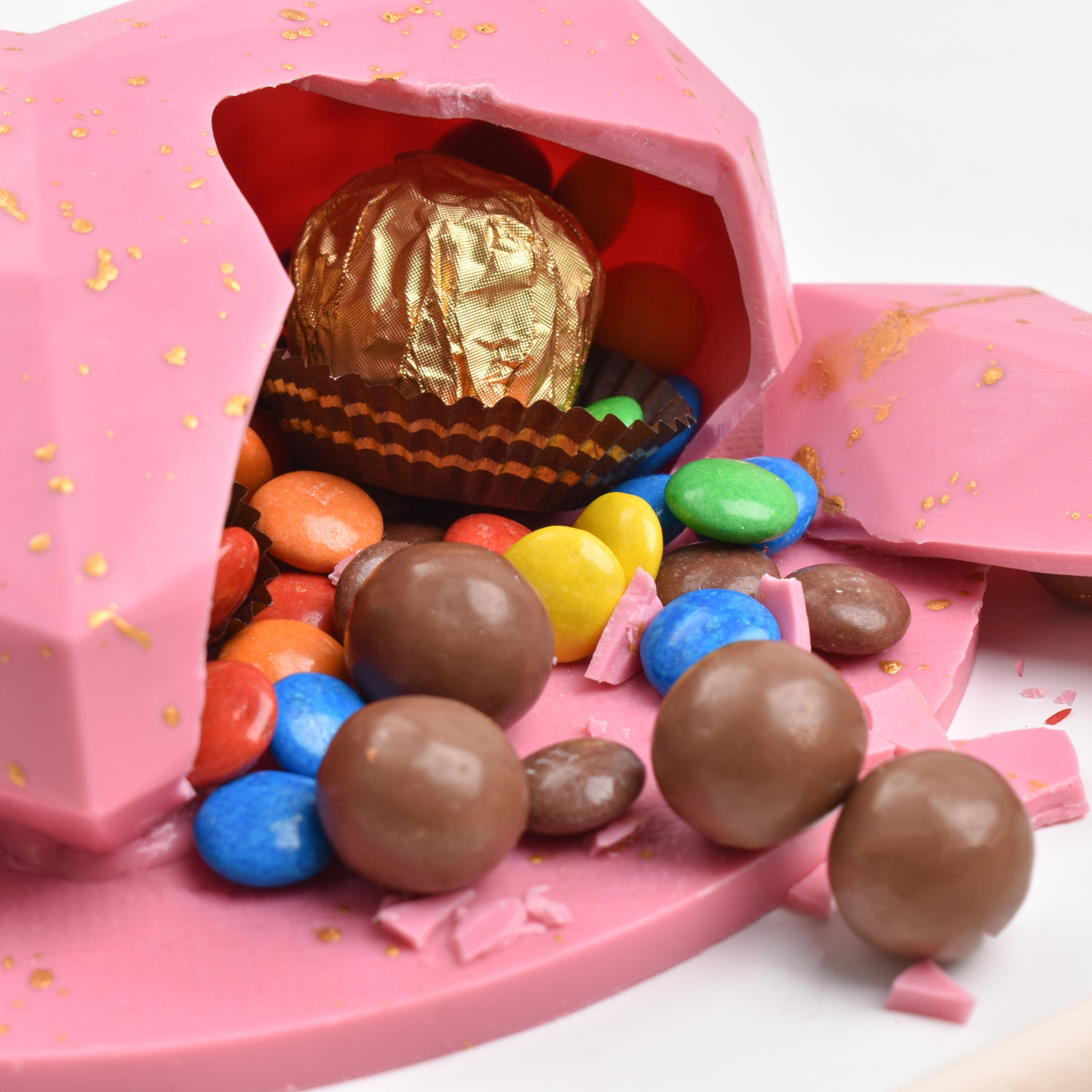 Online Pink Heart Shape Pinata Chocolate Gift Delivery in UAE - FNP