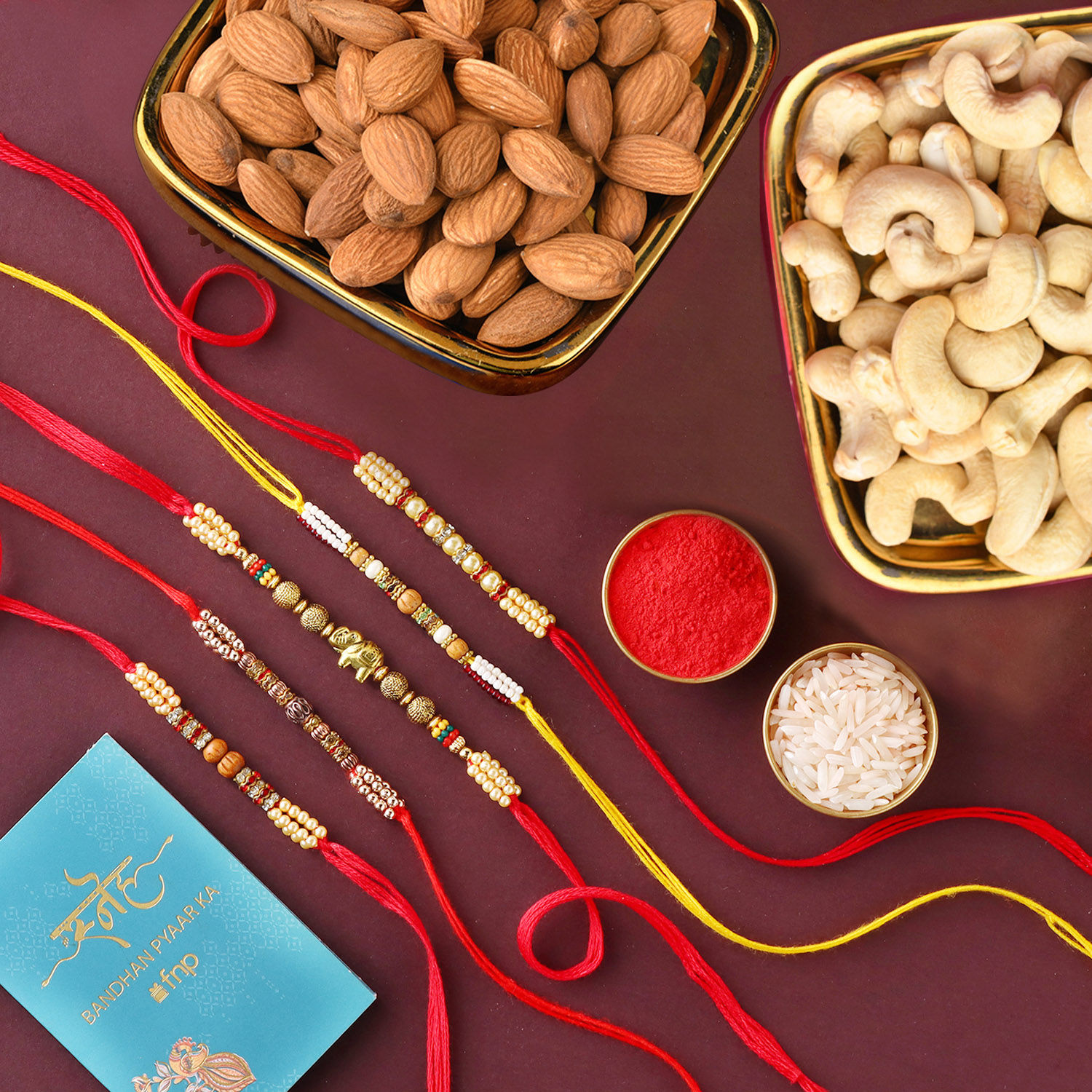 Online Sneh Traditional Beads Rakhi Set & Nuts Gift Delivery in UAE - FNP