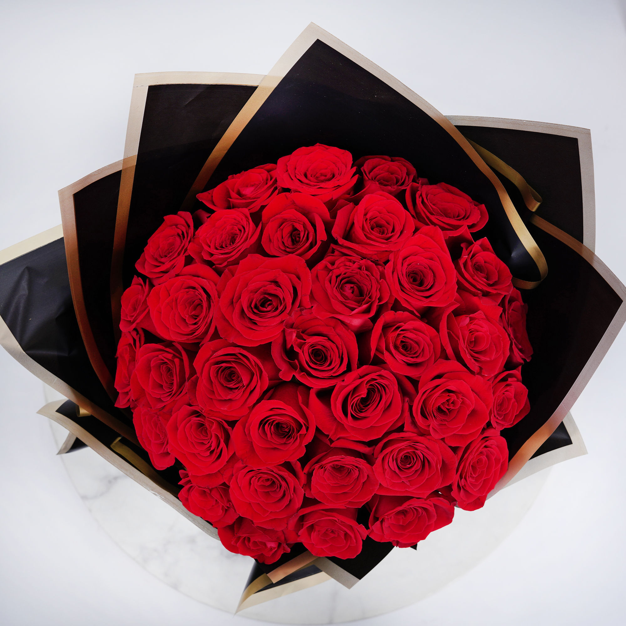 Order 35 Red Roses Designer Bouquet Online | Same-Day Delivery UAE - Fnp.ae