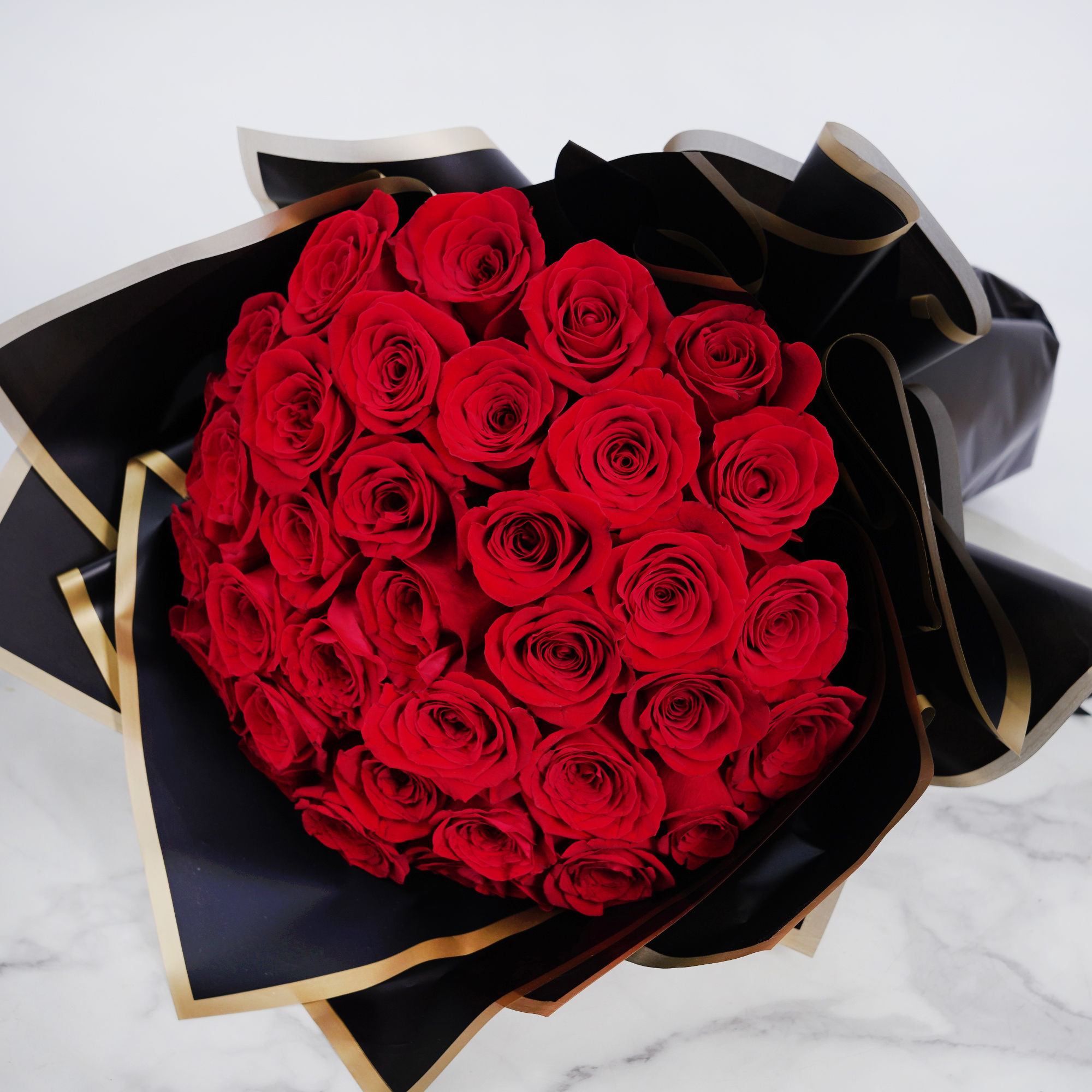 Order 35 Red Roses Designer Bouquet Online | Same-Day Delivery UAE - Fnp.ae