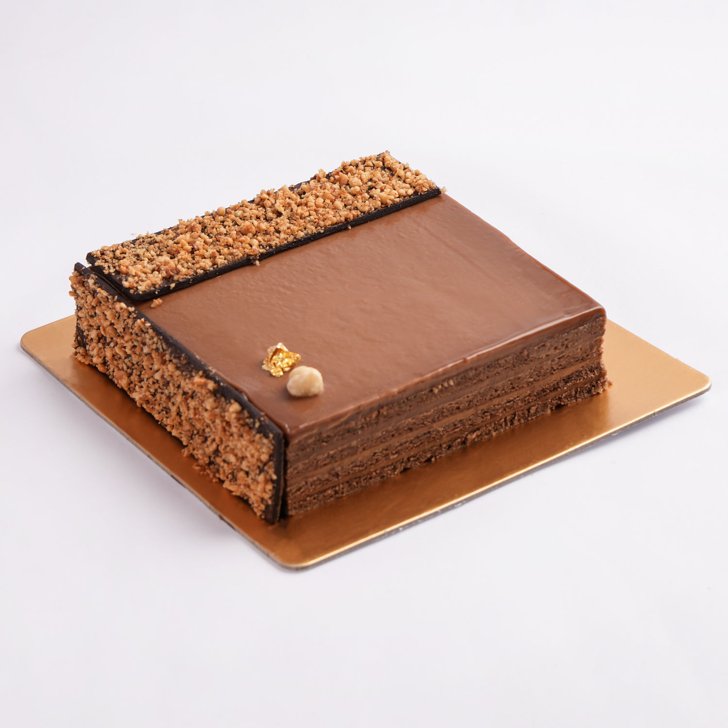 أون لاين كيك البندق بقطع برالين 4 حصص توصيل هدايا في UAE - FNP